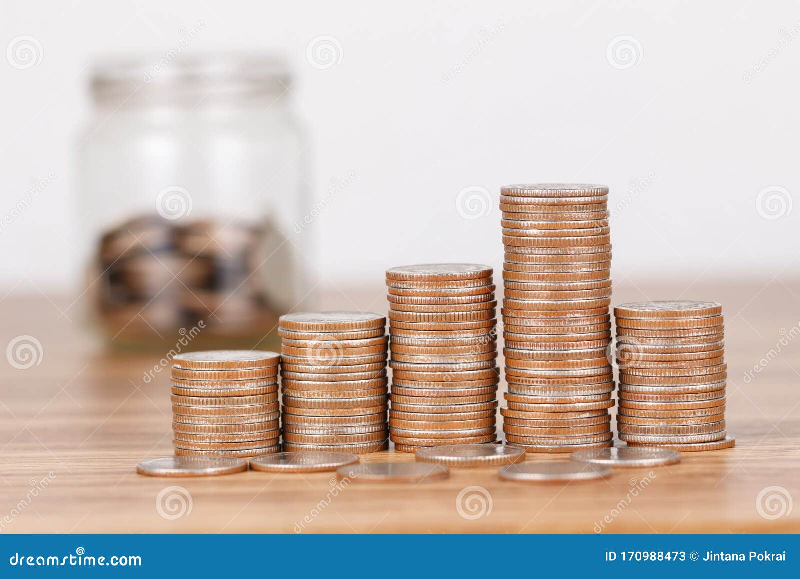 Stack of Coins on Wooden Desk for Saving Money Stock Image - Image of ...