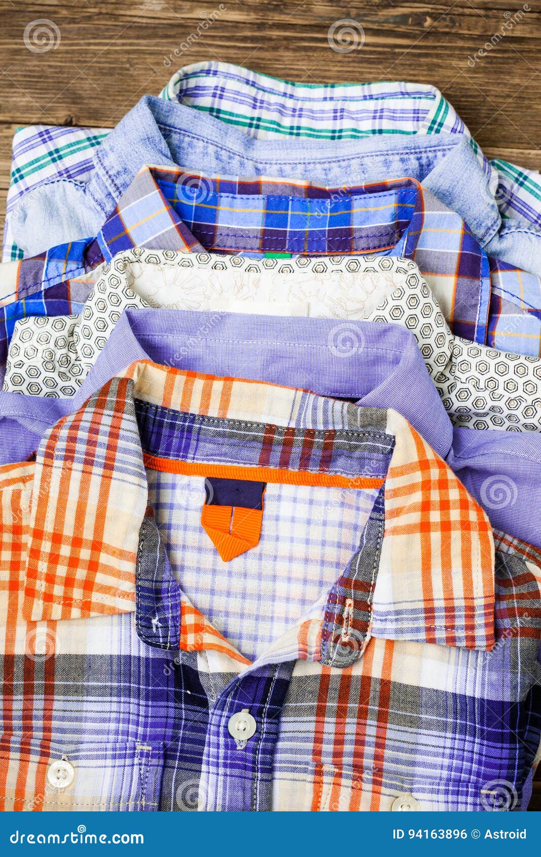 Stack of Colored Children Shirts Stock Photo - Image of choice, texture ...