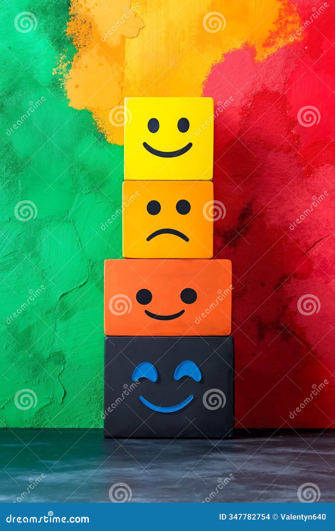 A Stack of Colorful Blocks with Smiley Faces on Them Stock Photo ...