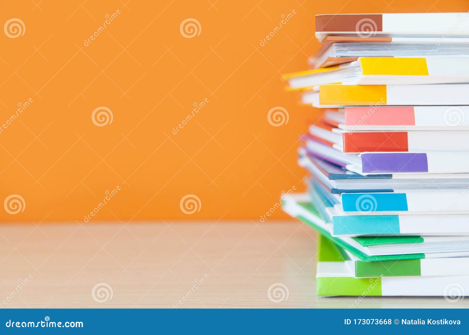 Stack of Colorful Books on Color Background Stock Photo - Image of ...
