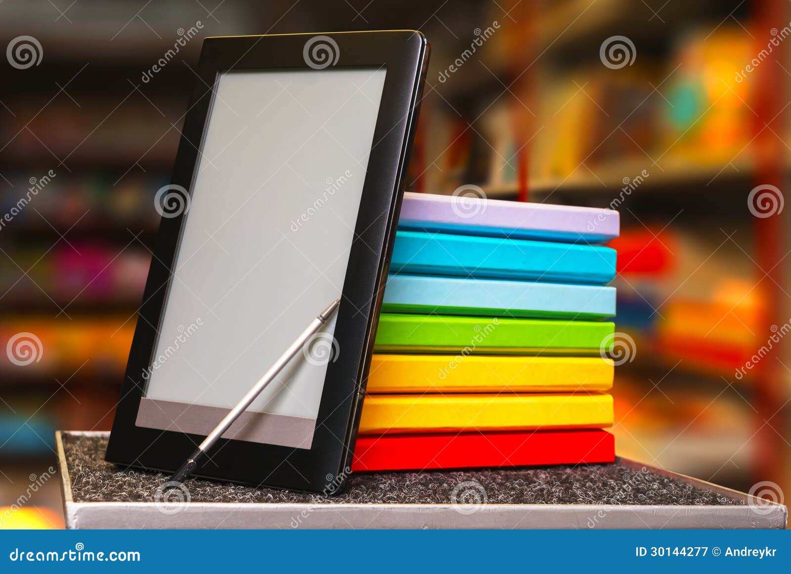 Stack of Colorful Books with Electronic Book Reader Stock Image - Image ...
