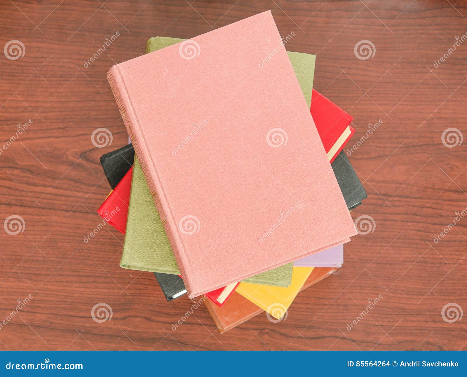 A Stack of Colorful Books in a Library Stock Photo - Image of ...