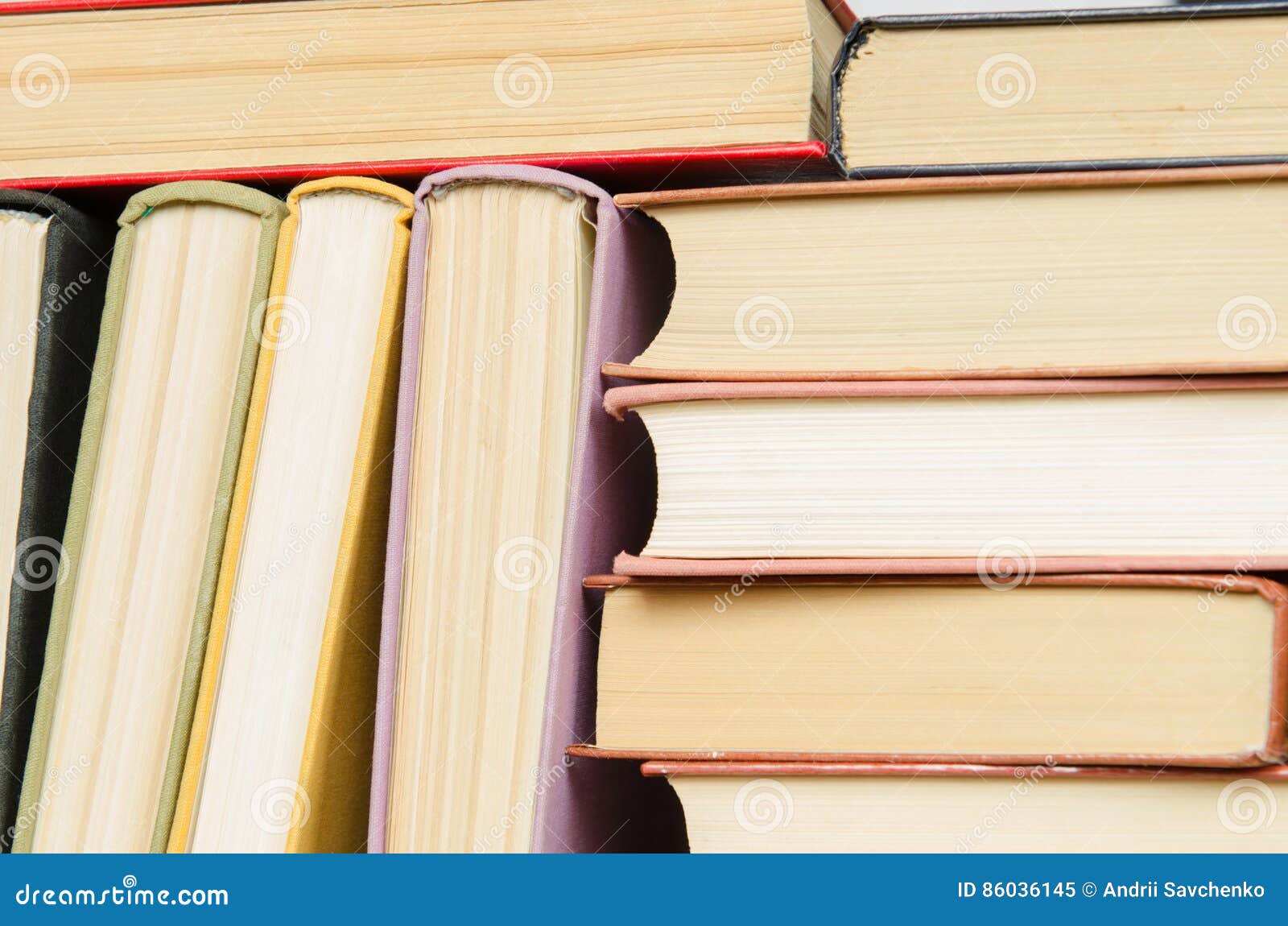A Stack of Colorful Books in a Library Stock Image - Image of books ...