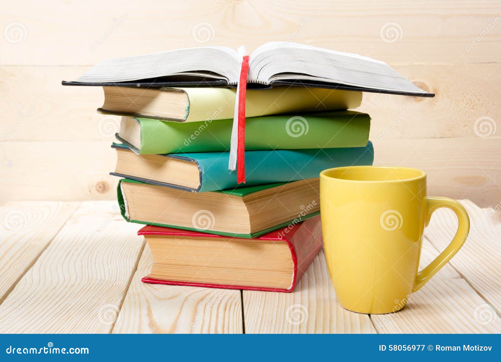 Stack of Colorful Books, Open Book and Cup on Wooden Table. Back To ...