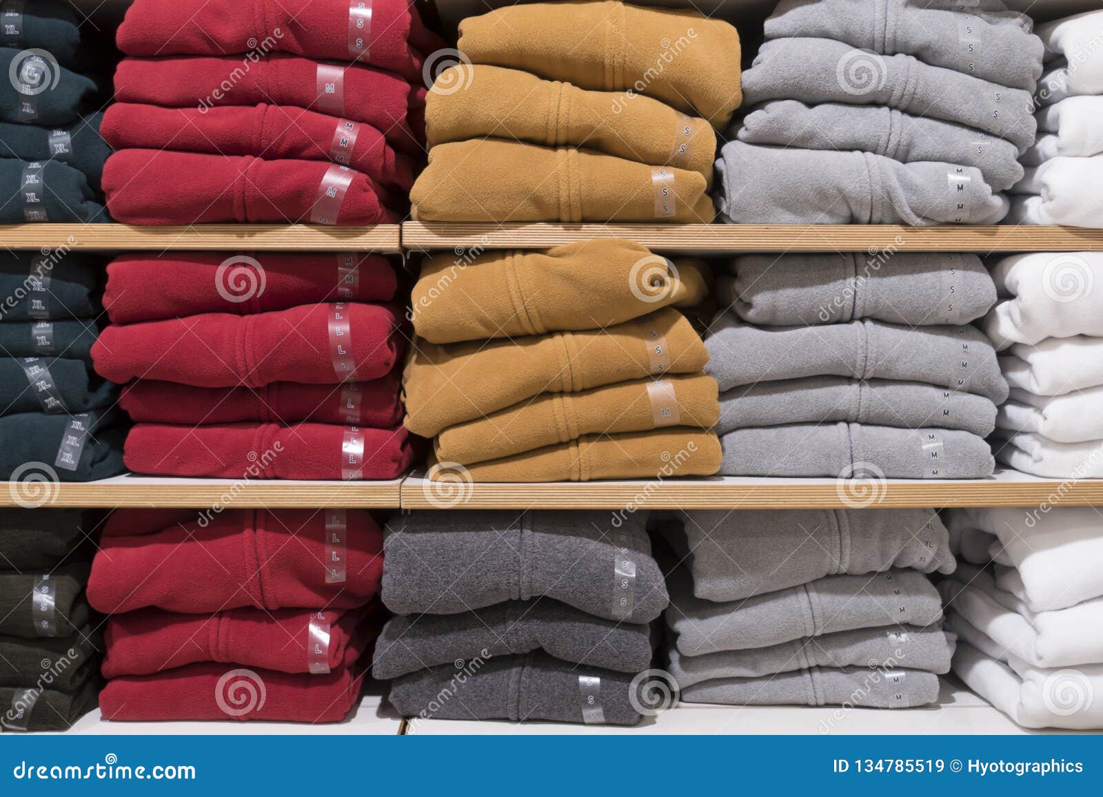 Stack of Colorful Clothes in the Shop Stock Image - Image of baskets ...