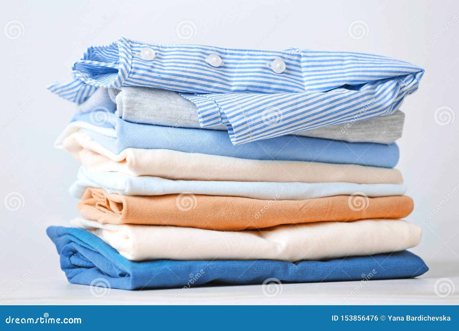 Stack of Colorful Cotton Clothes. Heap of Folded Laundry Stock Photo ...
