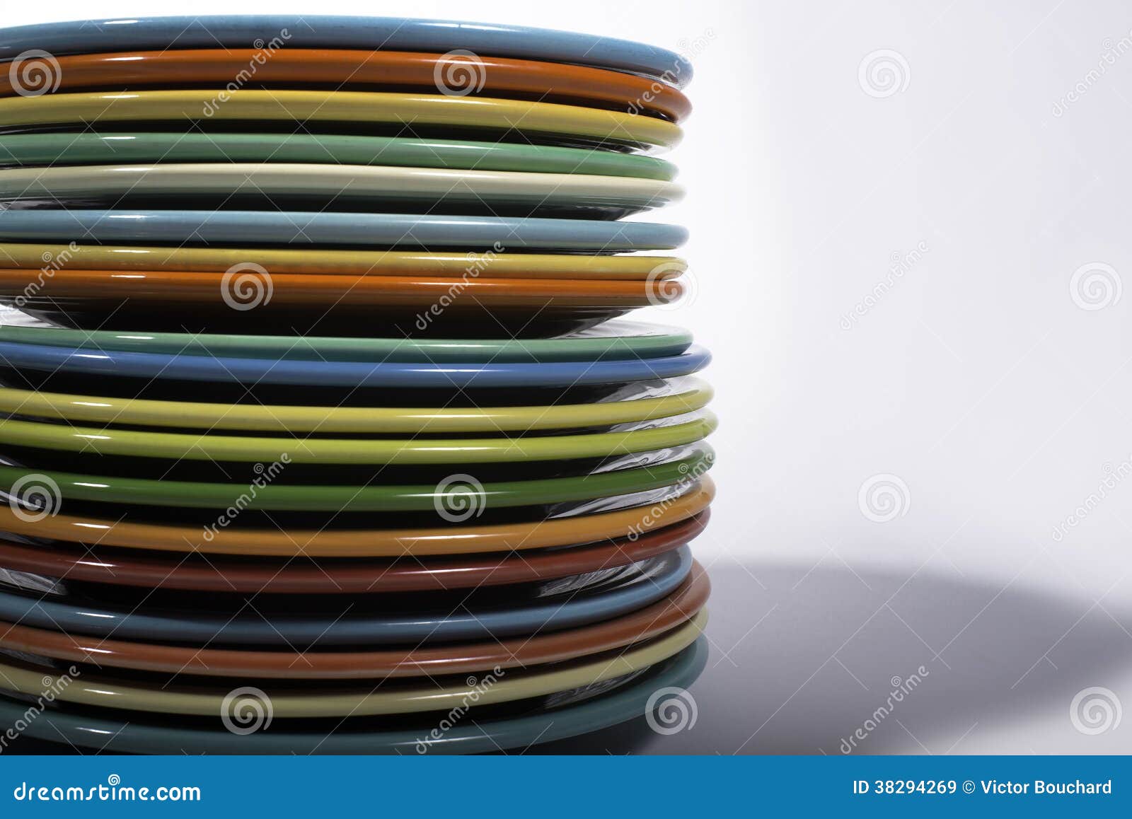 Stack of colorful dishes stock image. Image of dishes - 38294269