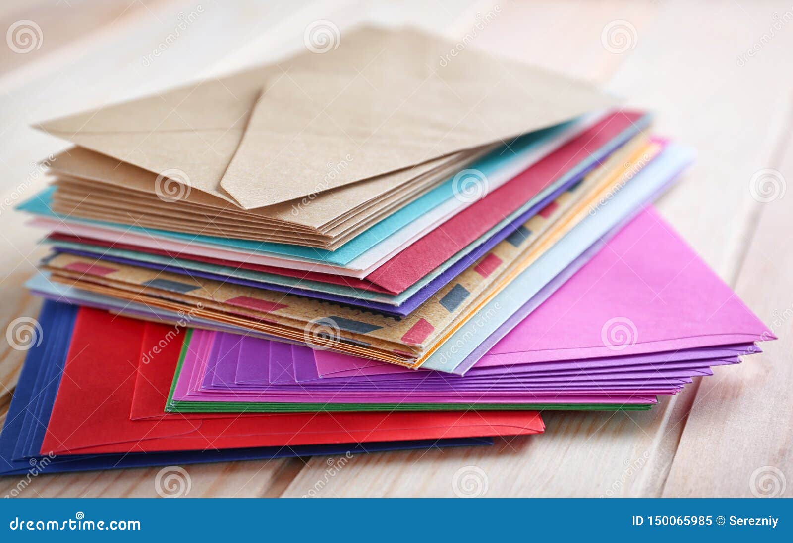 Stack of Colorful Envelopes on Wooden Table, Closeup. Mail Service ...