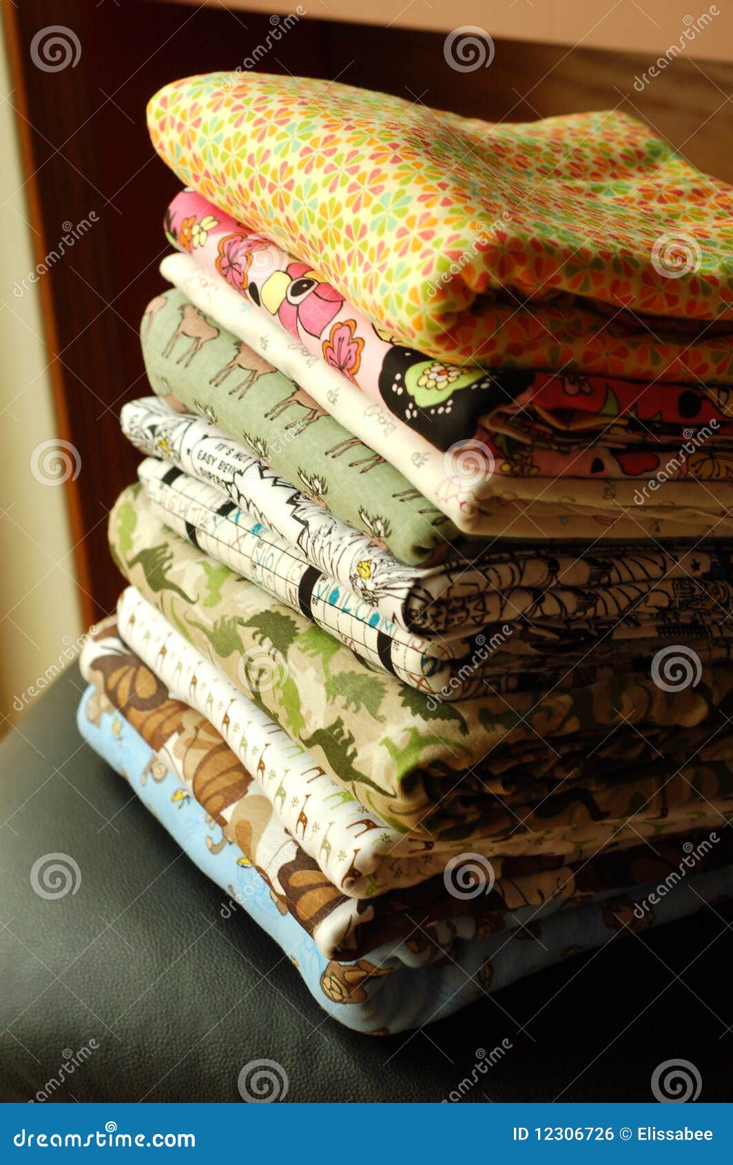 Stack of colorful fabrics stock photo. Image of colorful - 12306726