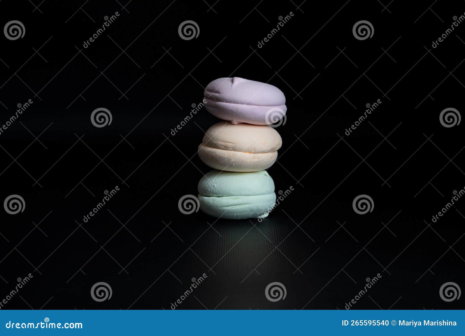 A Stack of Colorful Marshmallows on a Black Background Stock Photo ...