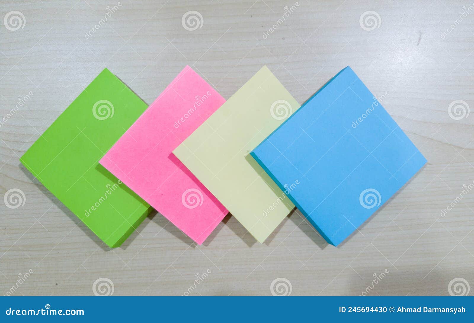 Stack of Colorful Memo Note Paper on Wooden Desk Table Stock Photo ...