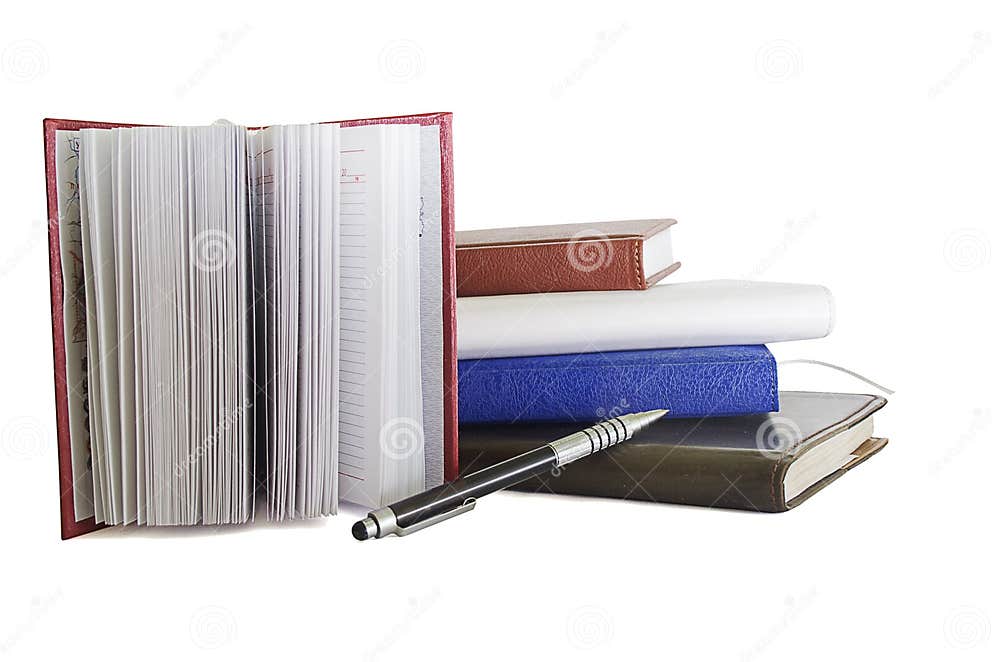 A Stack of Notebooks and Pen Overwhite Stock Photo - Image of personal ...