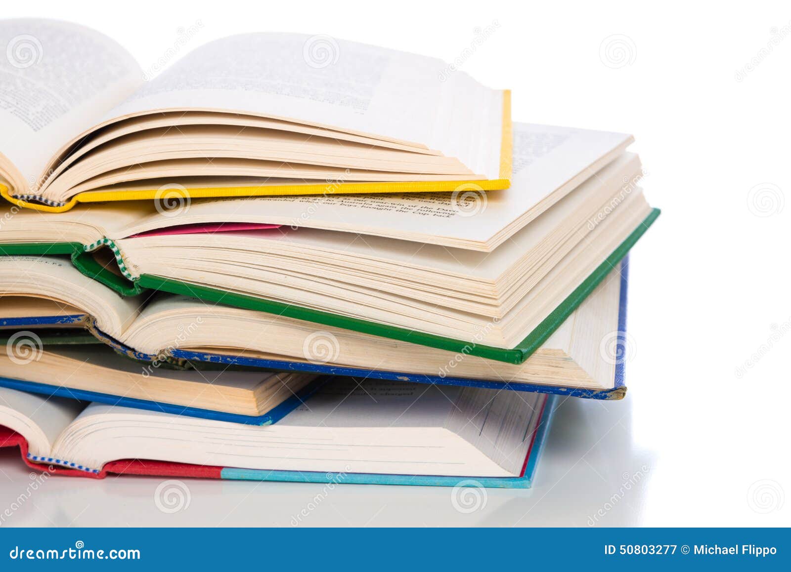 A Stack of Colorful, Open Books on a White Background Stock Image ...