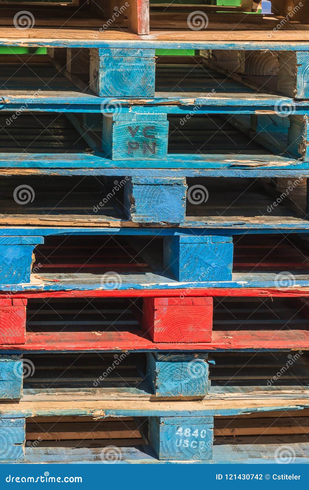 Stack of Colorful Pallets Waiting for a Load Stock Photo - Image of ...