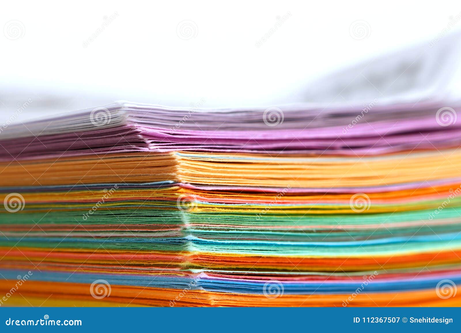 Stack of colorful papers stock image. Image of publishing - 112367507