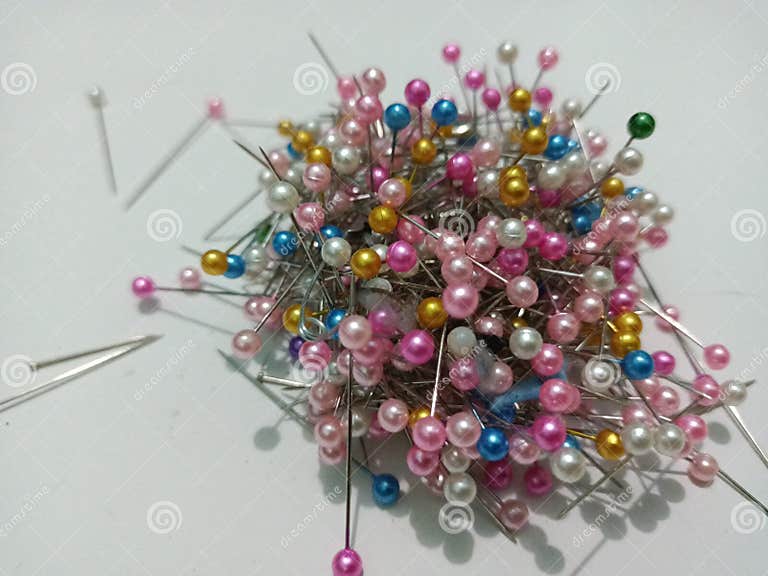 Stack of Colorful Pins on a White Background Stock Photo - Image of ...