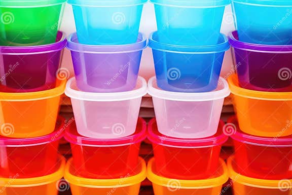 Stack of Colorful Plastic Containers with Attached Lids Stock Image ...