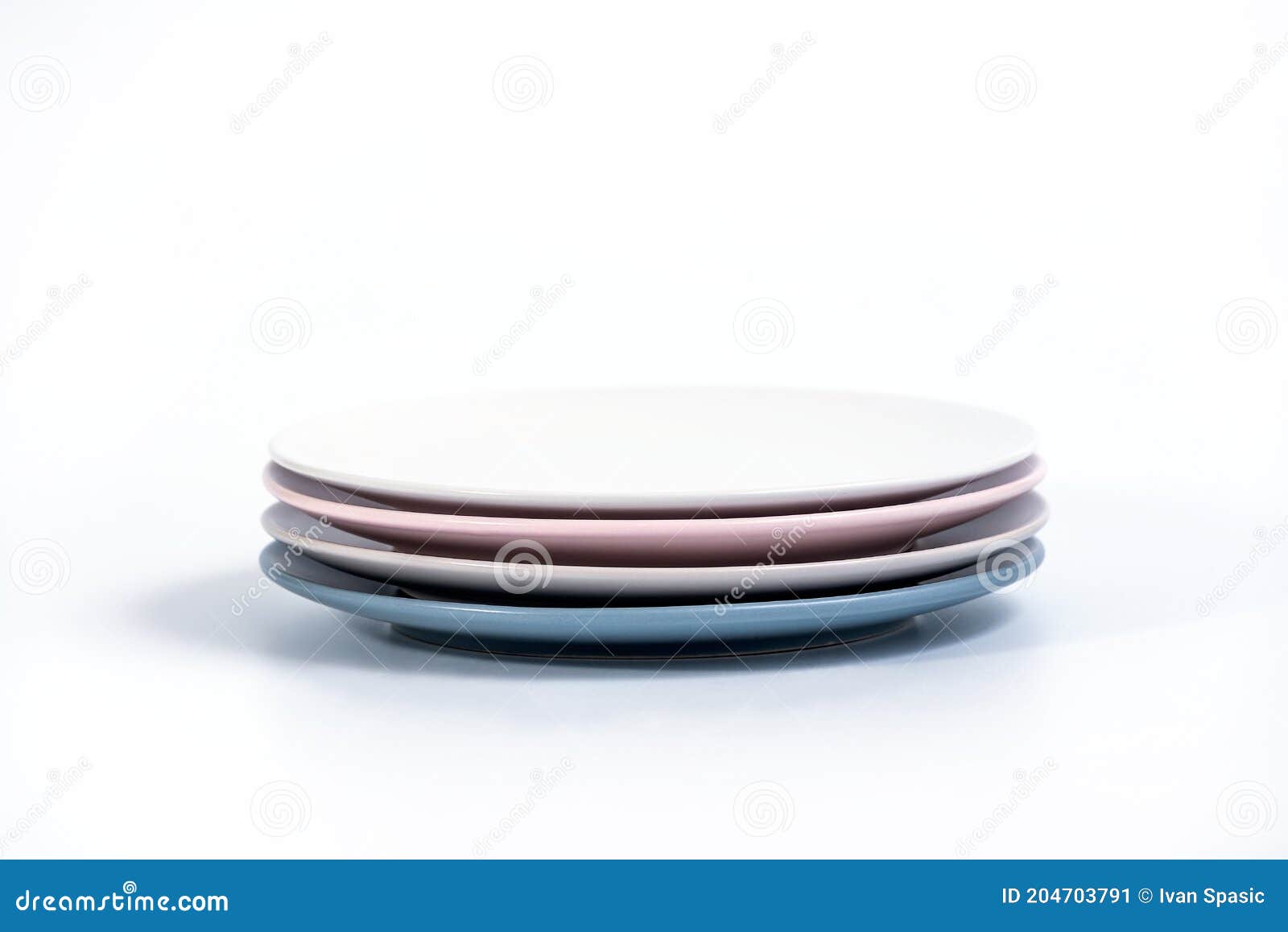 Stack of Colorful Plates Isolated on White Background Stock Image ...