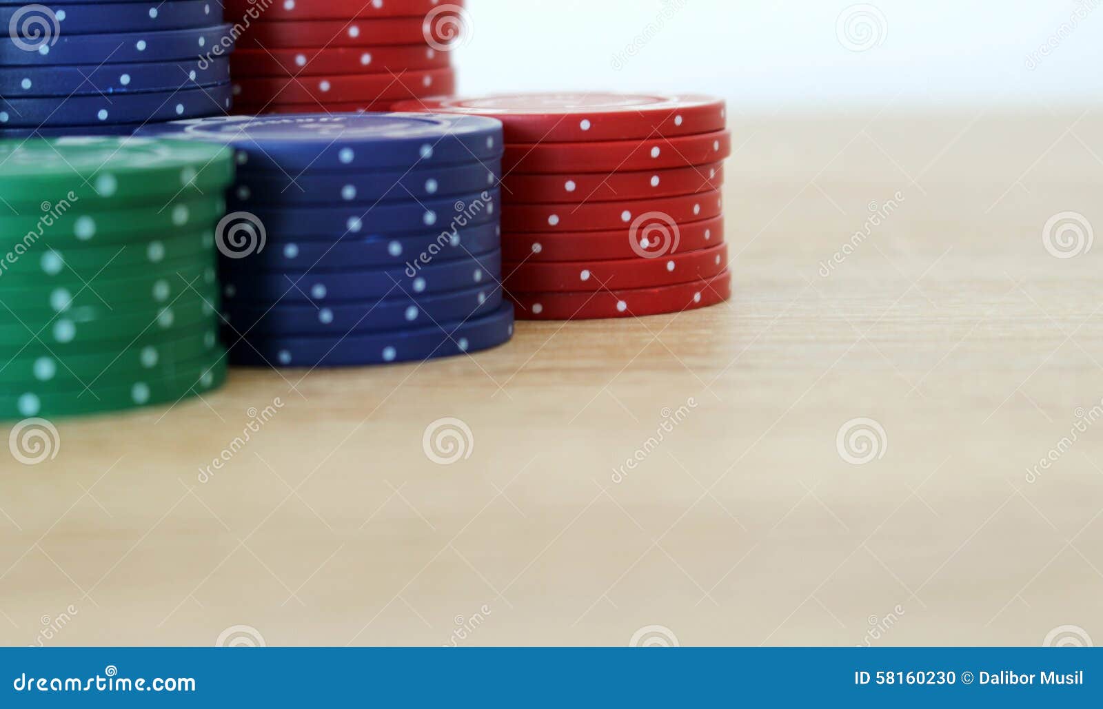 Stack of Colorful Poker Chips on a Table Stock Photo - Image of casino ...