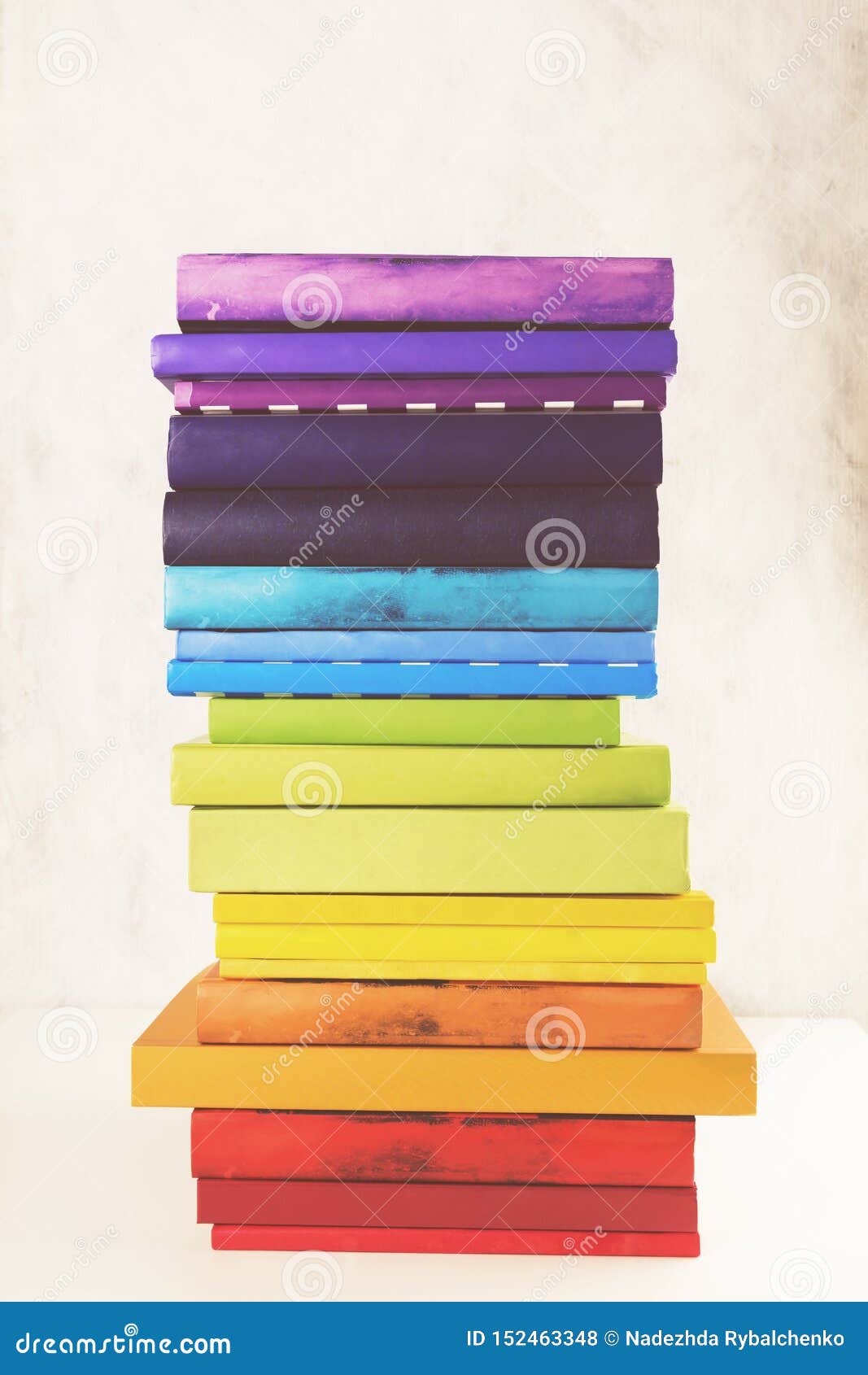 Stack of Colorful Rainbow Books on White Background. Toned Stock Photo ...