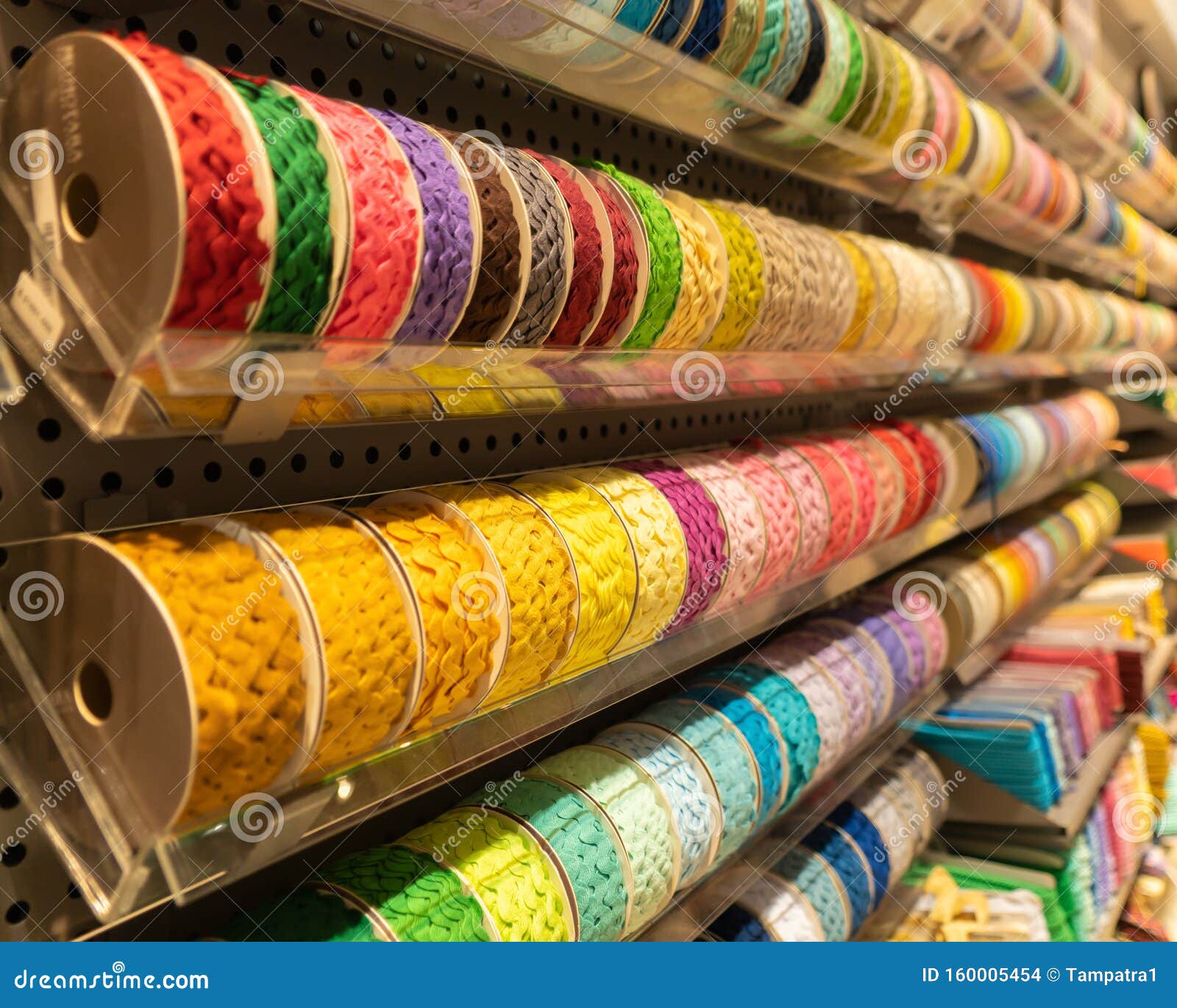 Stack of Colorful Sewing Threads, Spools of Thread on Shelves at Retail ...