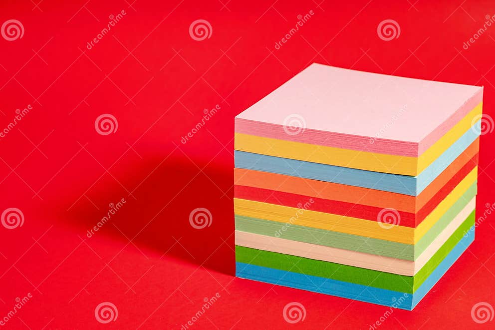 Stack of Colorful Sticky Notes Isolated on Red Background Stock Photo ...
