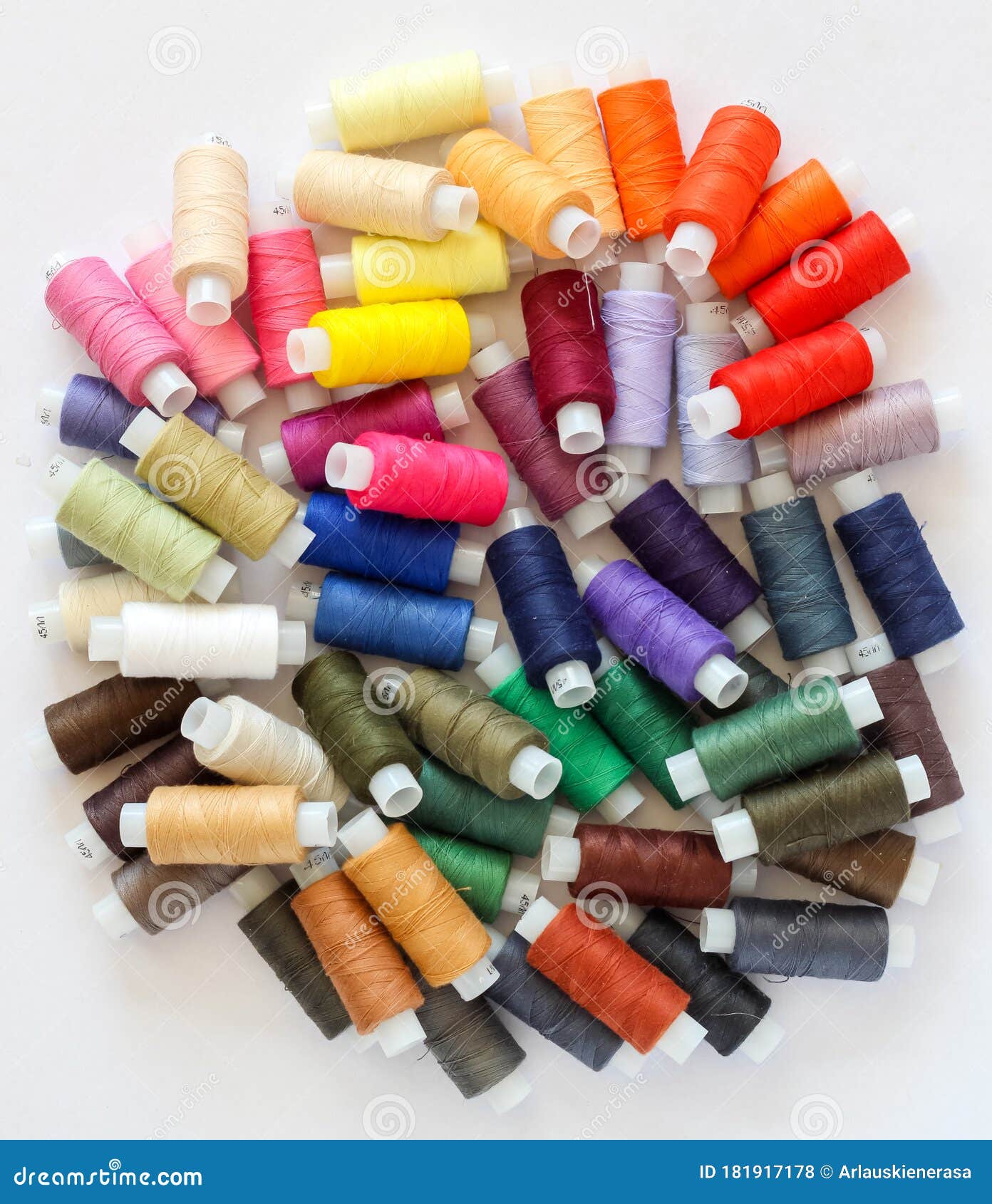 A Stack of Colorful Threads on a White Background Stock Photo - Image ...