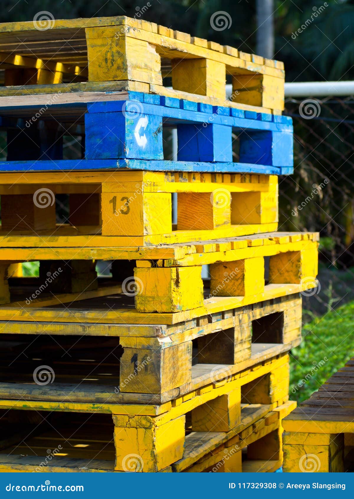 Stack of Colorful Wooden Pallets Used Stock Photo - Image of background ...