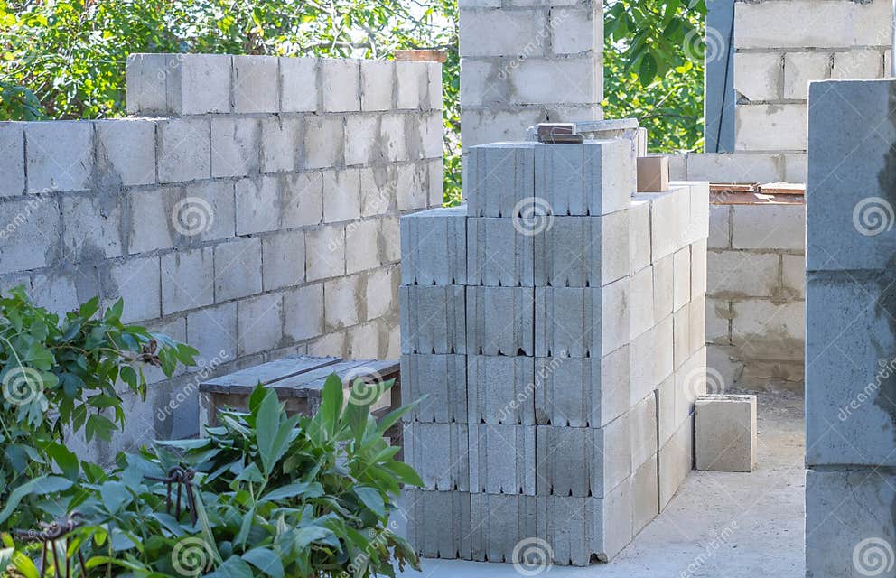 A Stack of Concrete Cinder Blocks is Set Up for Construction in the ...