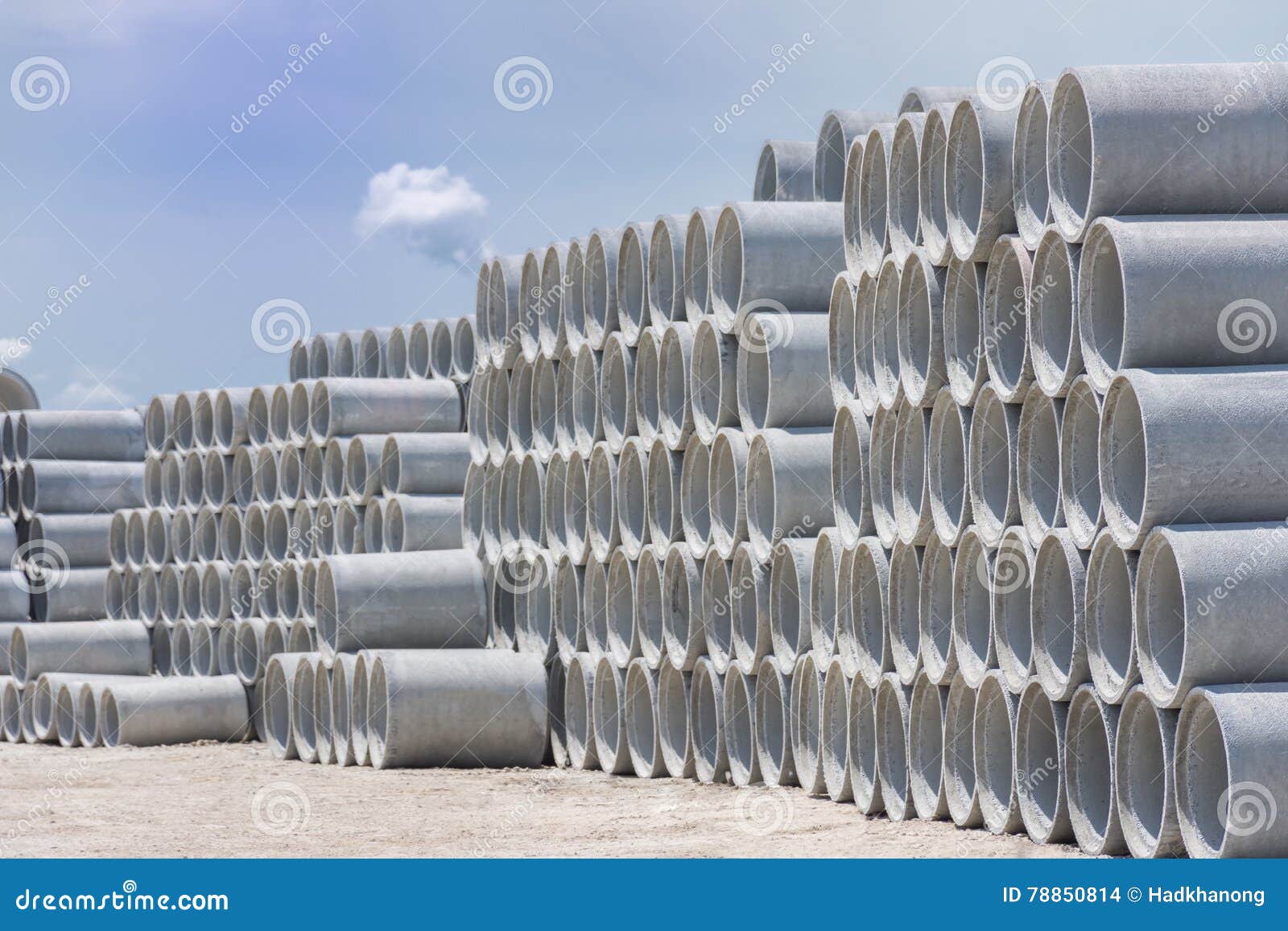 Stack of Concrete Drainage Pipes for Wells Stock Photo - Image of blue ...