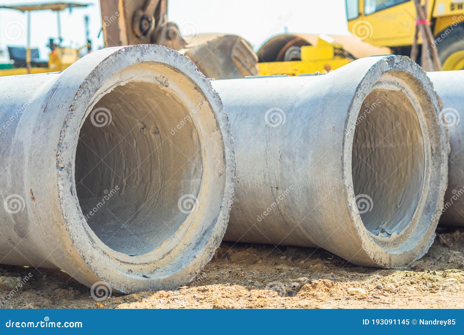 Stack of Concrete Drainage Pipes for Wells Water Discharges Laying an ...