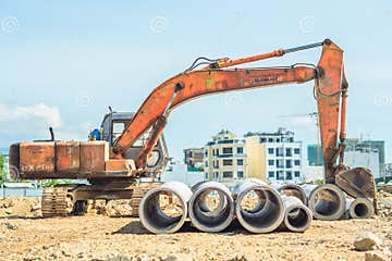Stack of Concrete Drainage Pipes for Wells Water Discharges Laying an ...