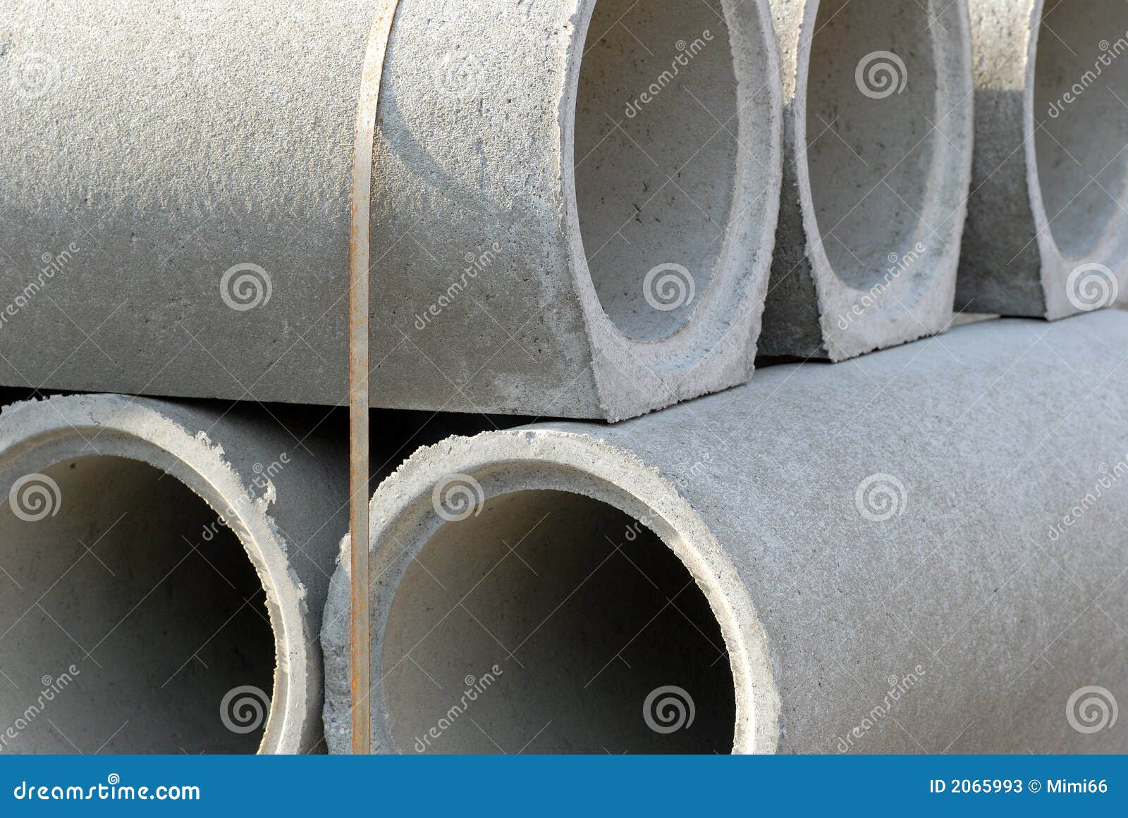 Stack of concrete pipes stock image. Image of heavy, material - 2065993