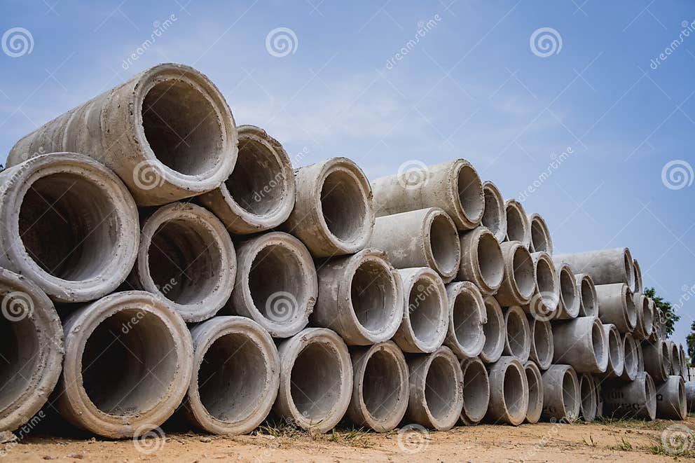 A Stack of Concrete Ring Pipes Piled and Creating a Symmetrical ...