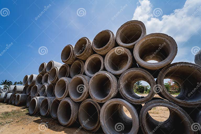 A Stack of Concrete Ring Pipes Piled and Creating a Symmetrical ...