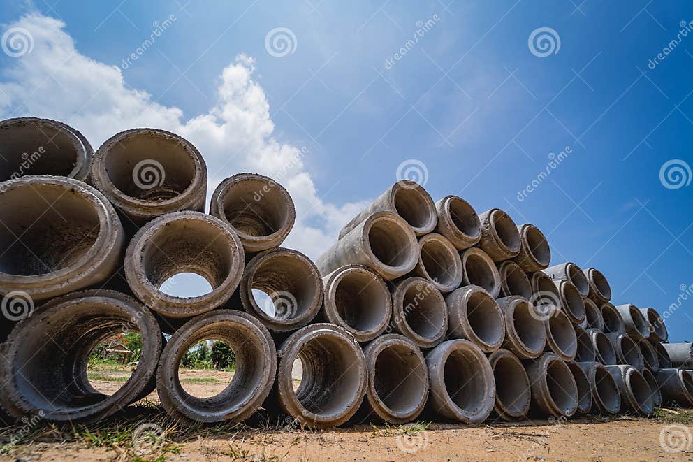 A Stack of Concrete Ring Pipes Piled and Creating a Symmetrical ...