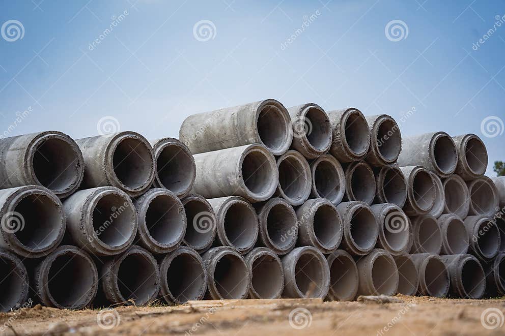 A Stack of Concrete Ring Pipes Piled and Creating a Symmetrical ...