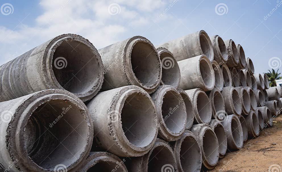 A Stack of Concrete Ring Pipes Piled and Creating a Symmetrical ...