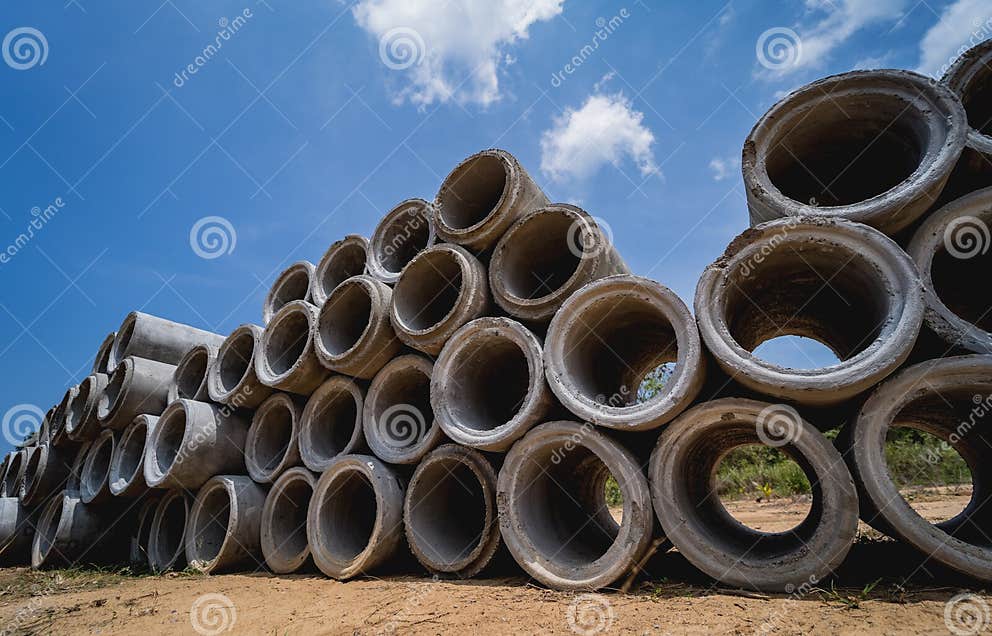 A Stack of Concrete Ring Pipes Piled and Creating a Symmetrical ...