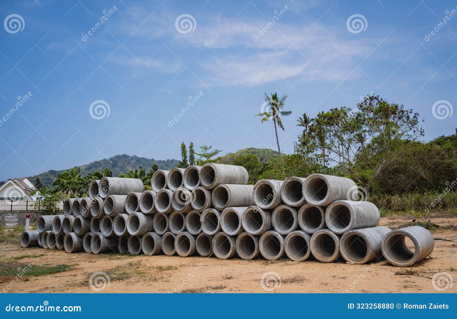 A Stack of Concrete Ring Pipes Piled and Creating a Symmetrical ...