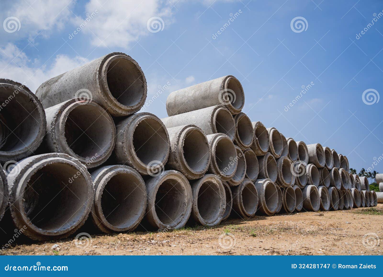 A Stack of Concrete Ring Pipes Piled and Creating a Symmetrical ...