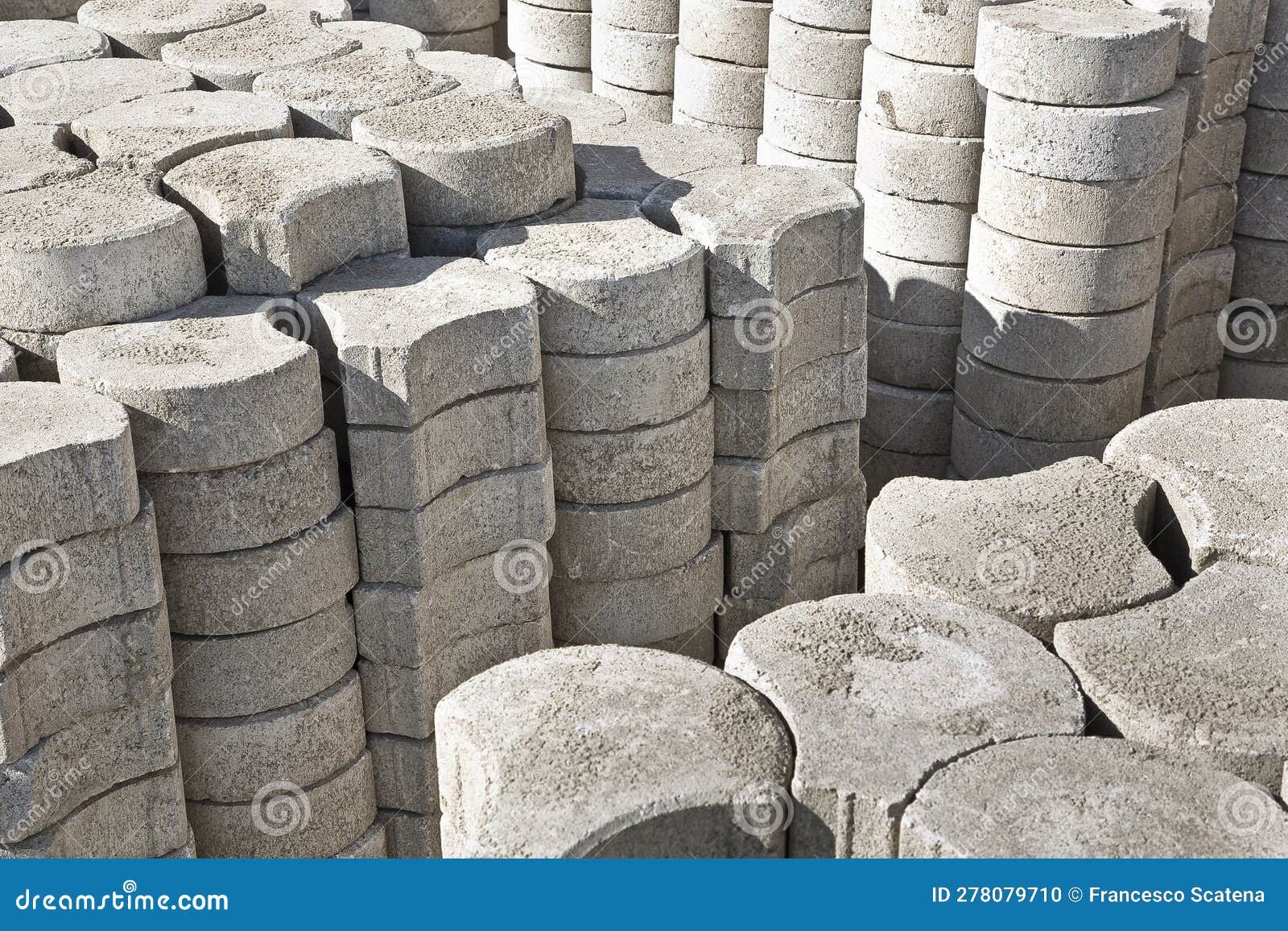 Stack of Concrete Self Locking Flooring Blocks in Curved Shape on ...