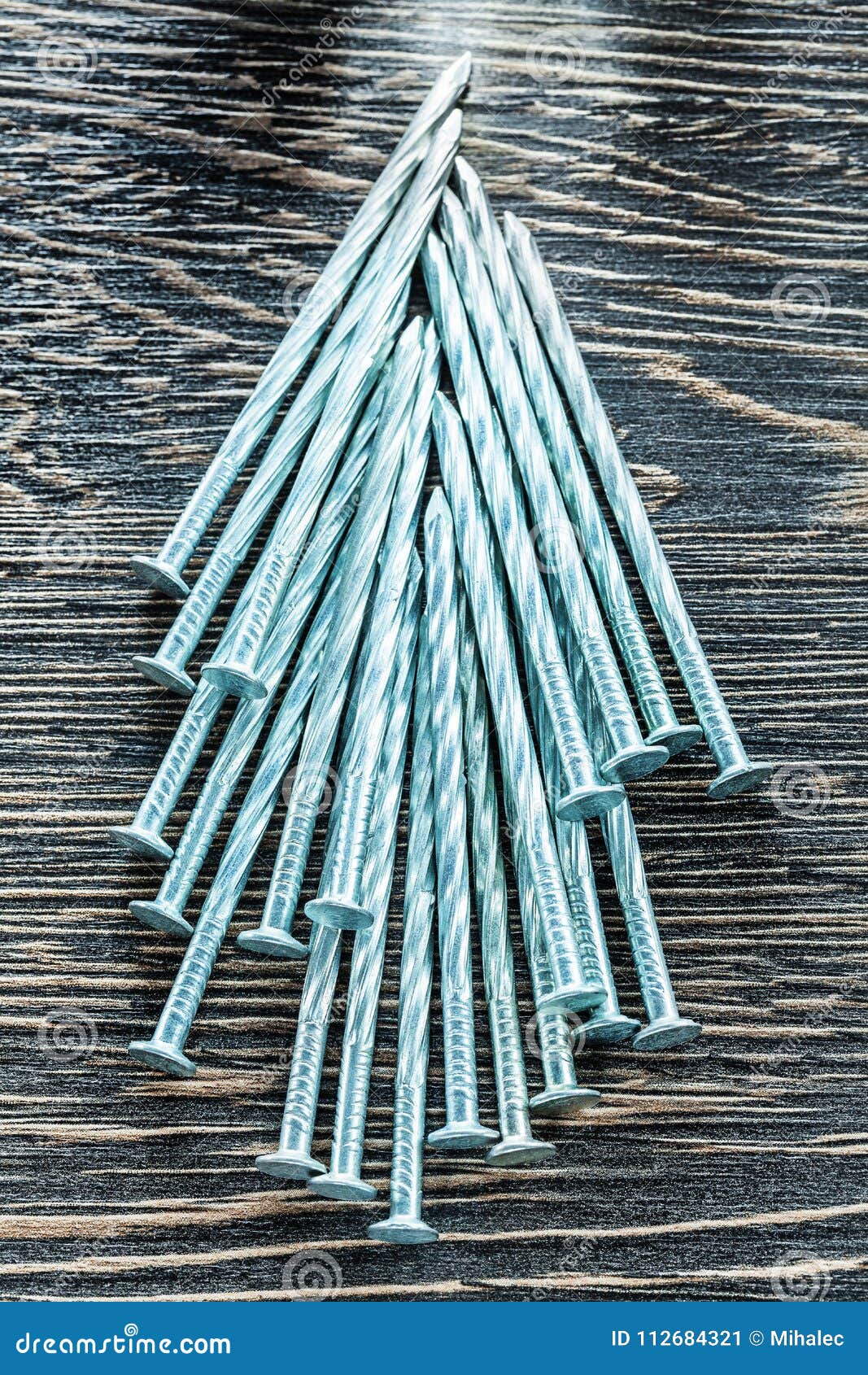 Stack of Construction Nails on Wooden Board Stock Image - Image of ...
