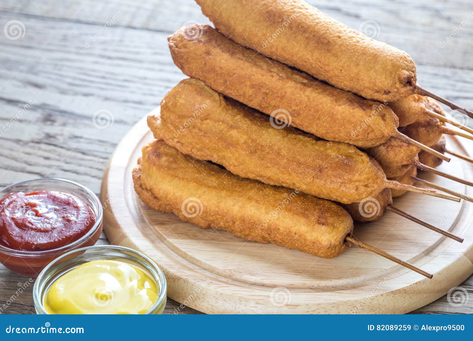 Stack of Corn Dogs on the Wooden Board Stock Image - Image of ...
