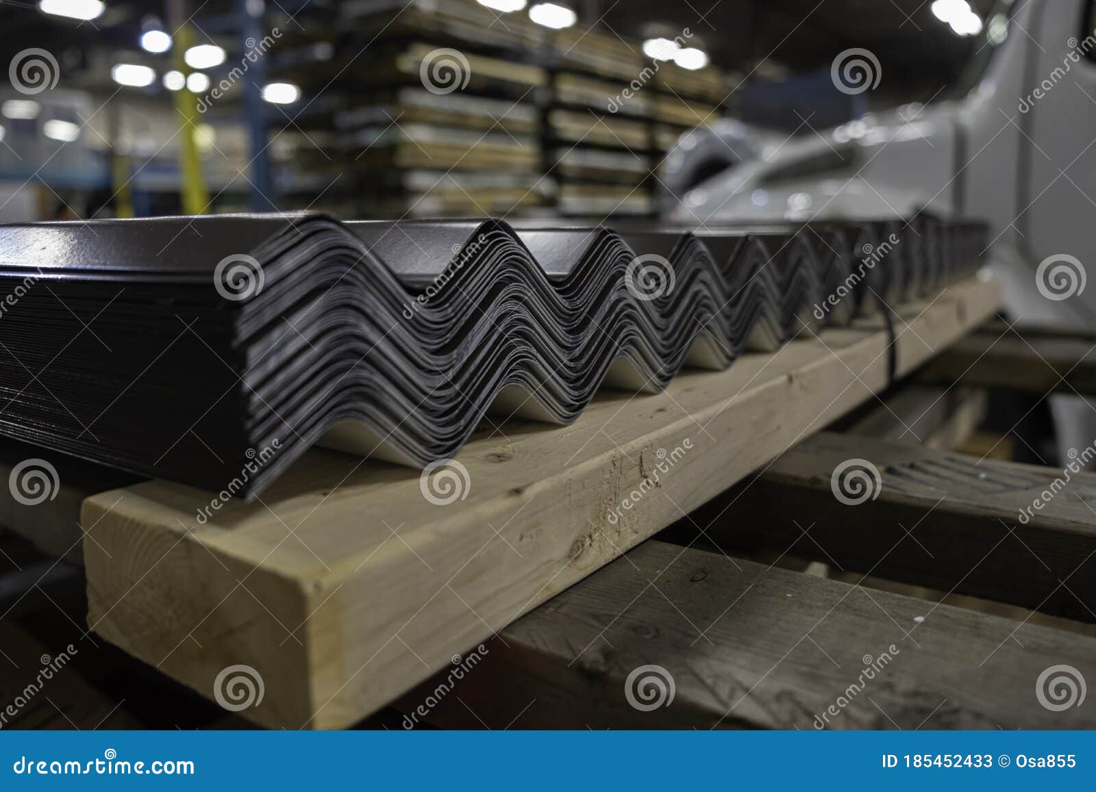 A Stack of Corrugated Roofing Sheets on Wooden Pallet for Delivery ...