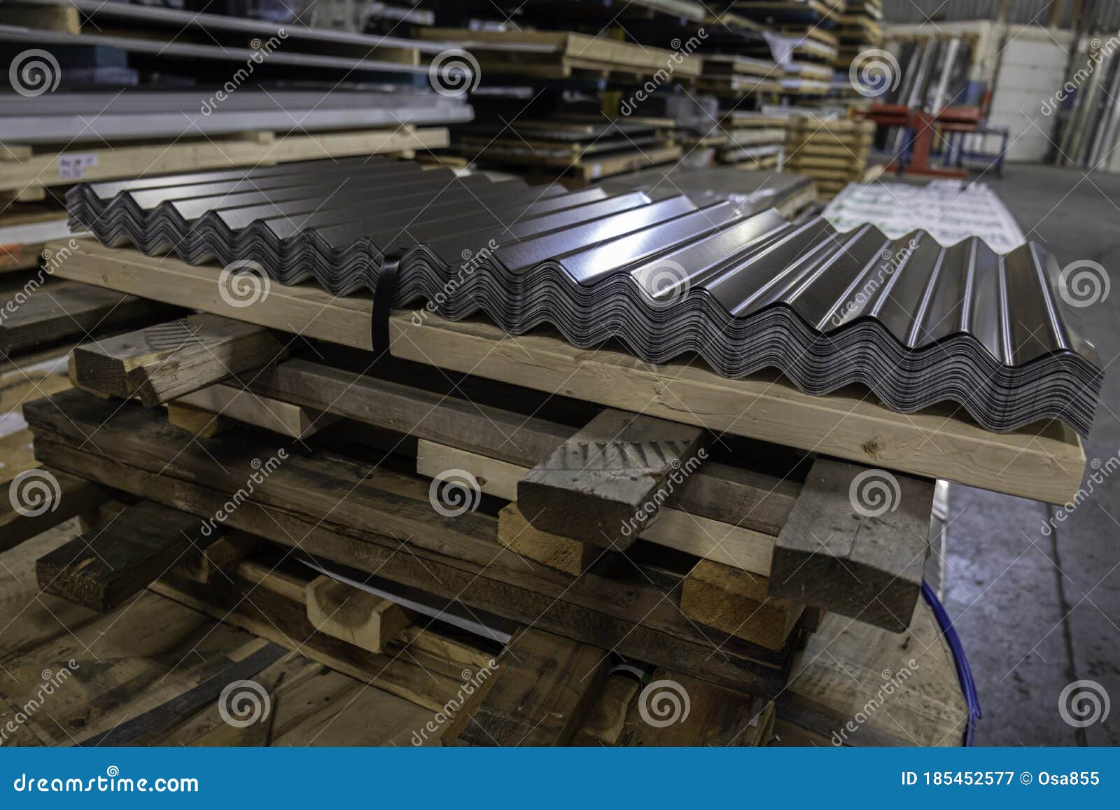 A Stack of Corrugated Roofing Sheets on Wooden Pallet for Delivery ...