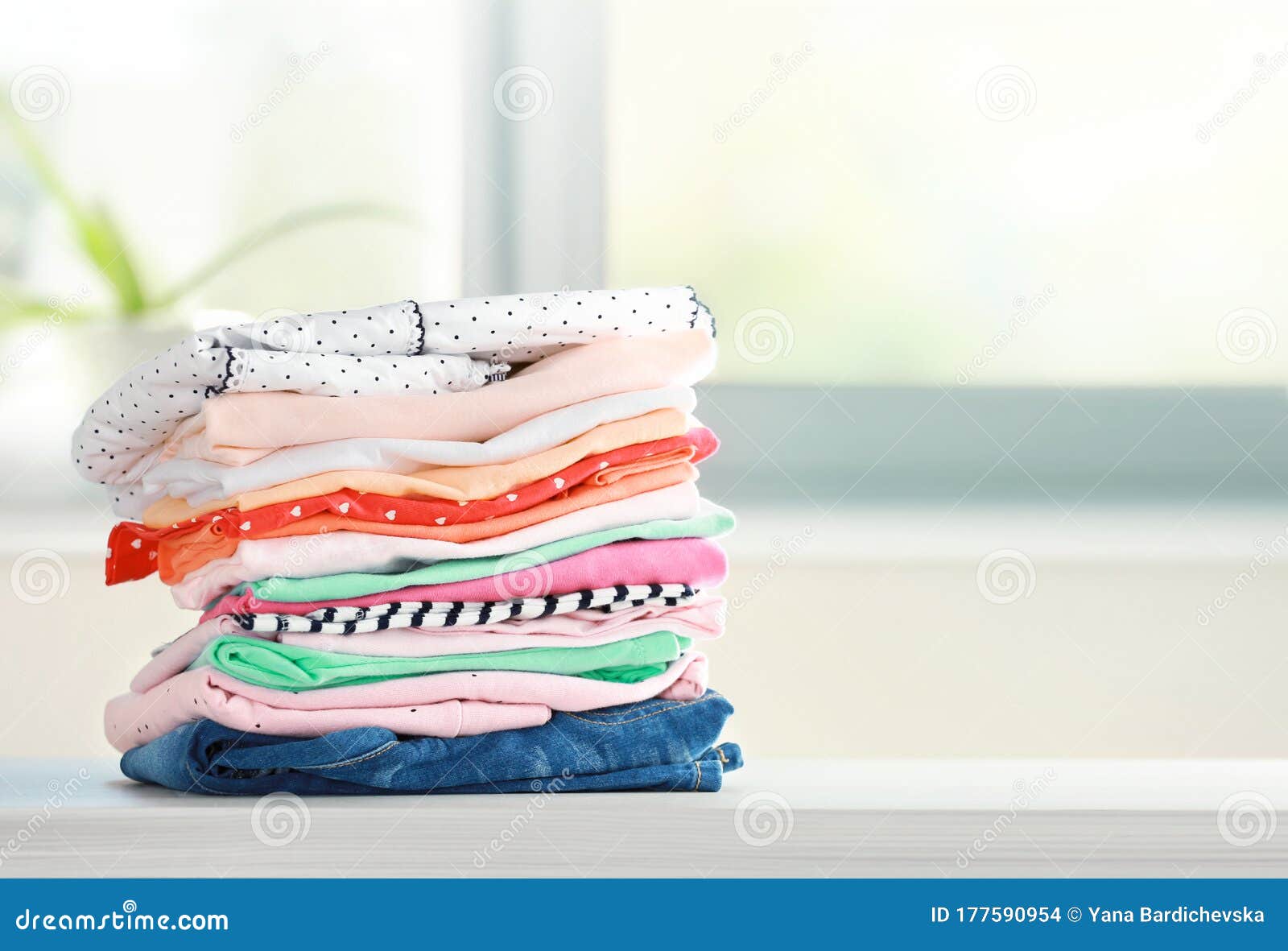 Stack of Cotton Colorful Clothes,folded Clothing on Table Empty Space ...