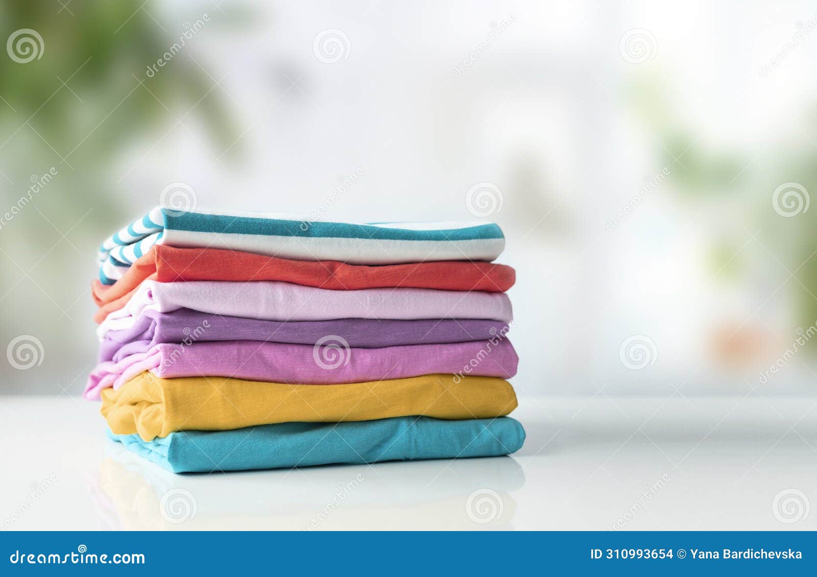 Stack of Cotton Colorful Clothes on White Table Empty Copy Space ...