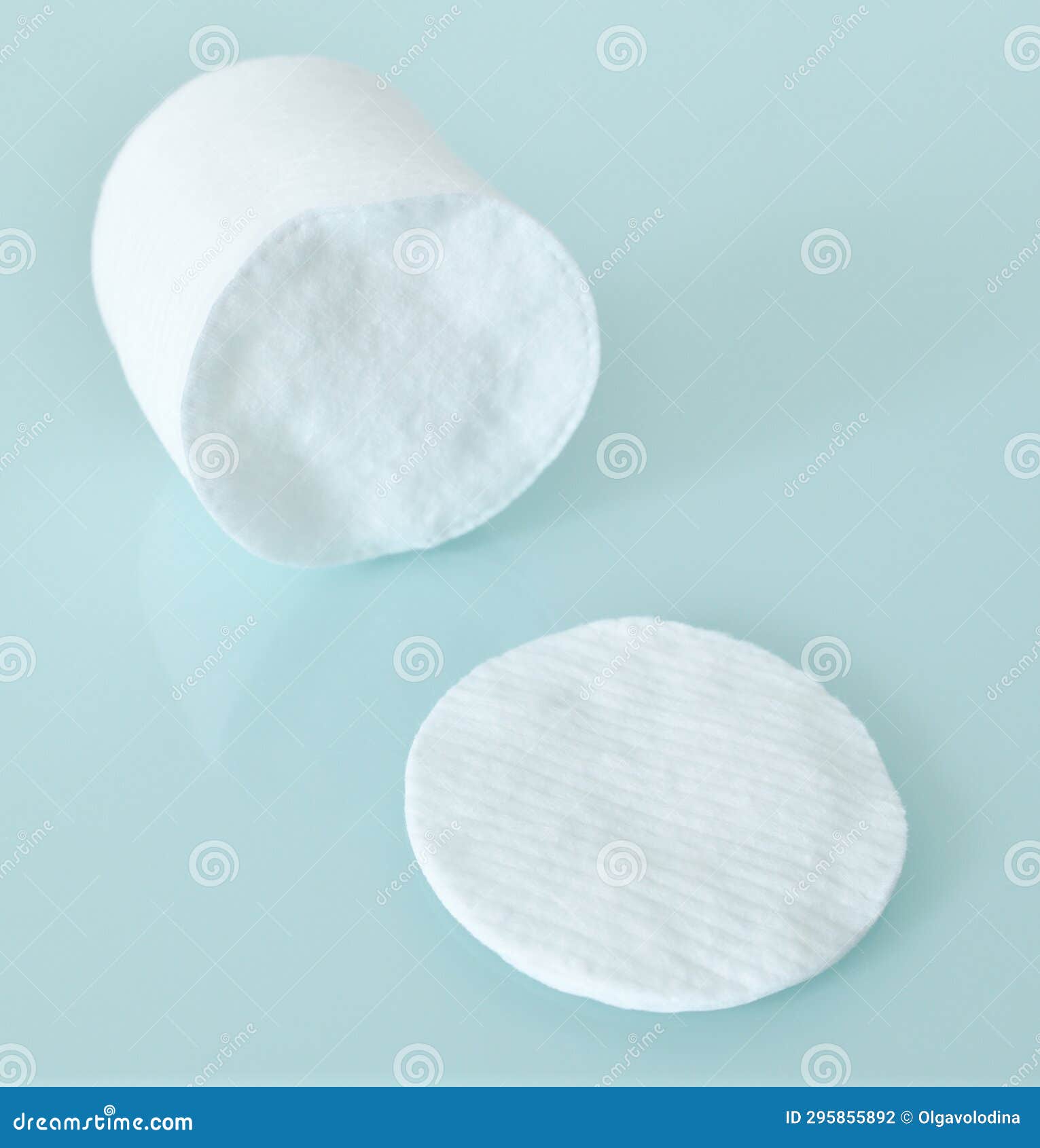 Stack of Cotton Disks on Light Blue Background Stock Photo - Image of ...