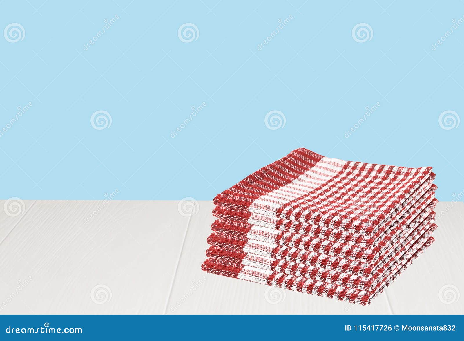Stack of Cotton Kitchen Napkin on White Table Empty Blue Space ...